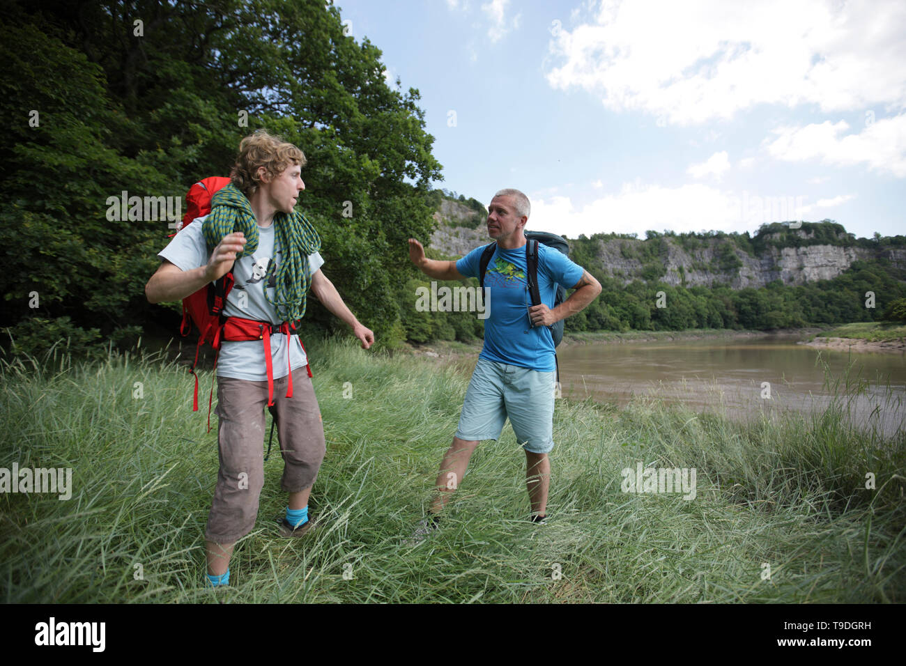 Two male climbers celebrate their successful climb at Lancaut cliffs on ...