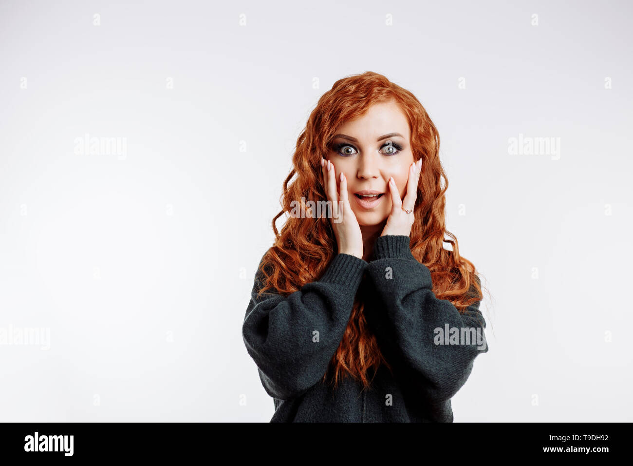 Facial expression, body language. Portrait of surprised woman reacting ...