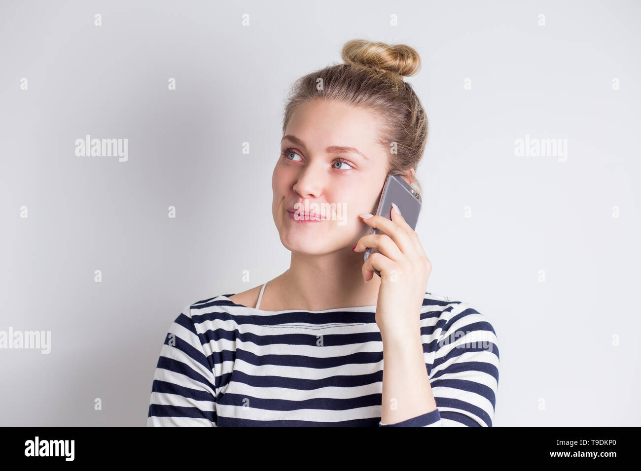 Happy woman phone talking. Face with toothy smile, isolated over white ...