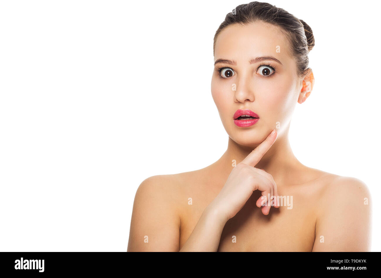 Beautiful Surprised Brunette Woman On White Isolate Background
