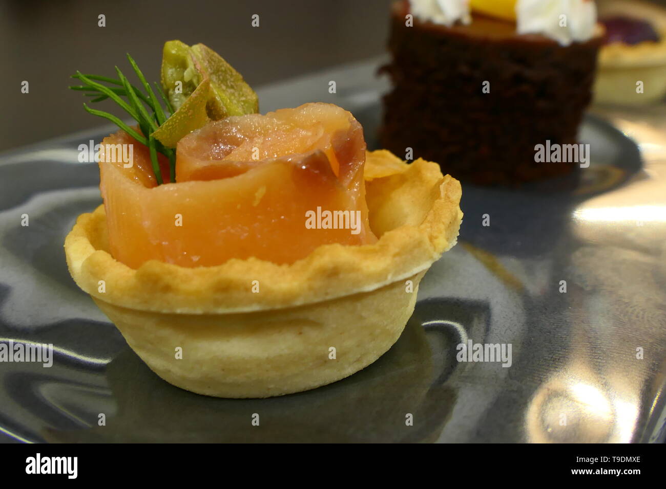 A small salmon Petit in an edible pastry Stock Photo - Alamy