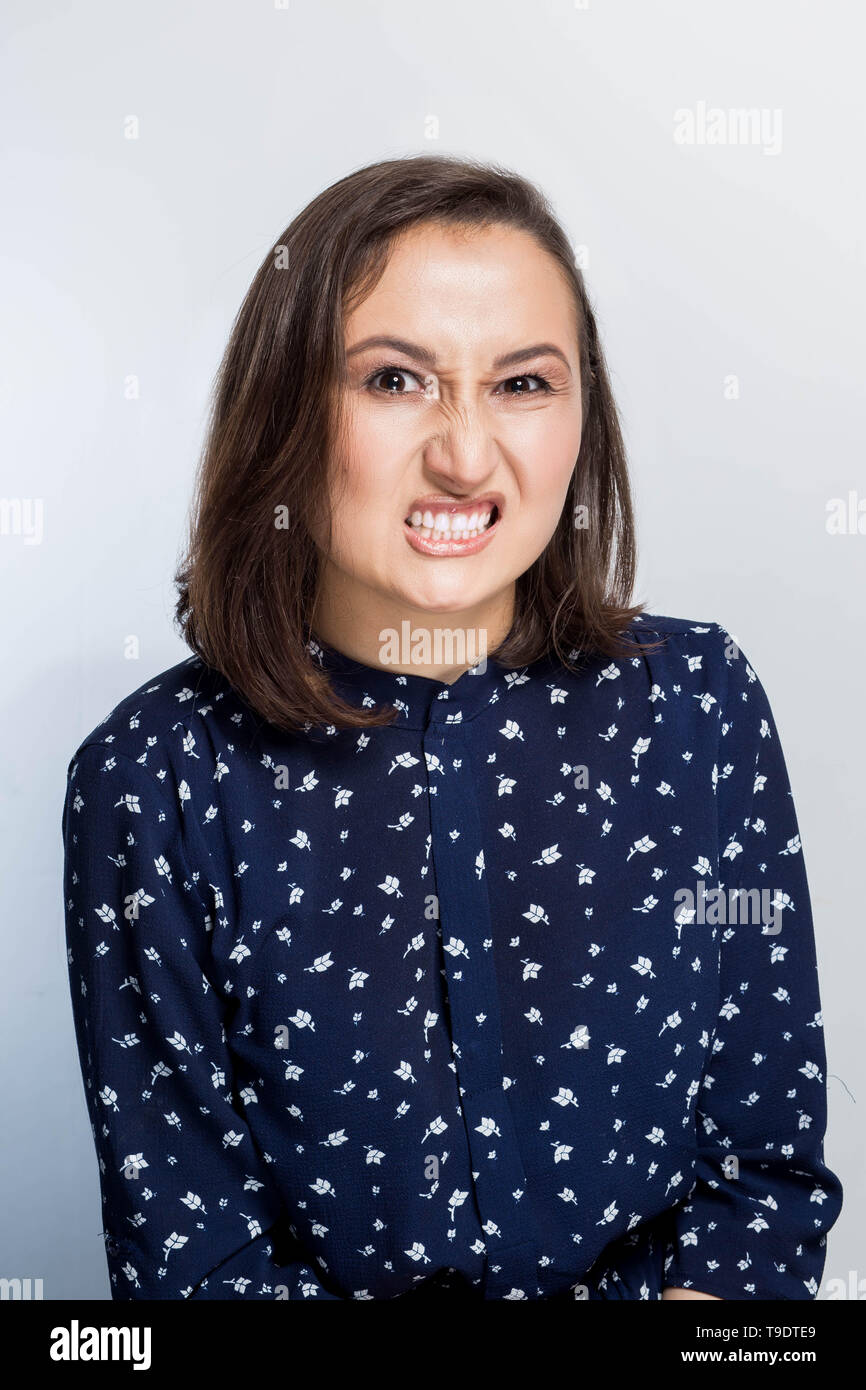Close up portrait of young annoyed Frustrated And Angry woman on a ...
