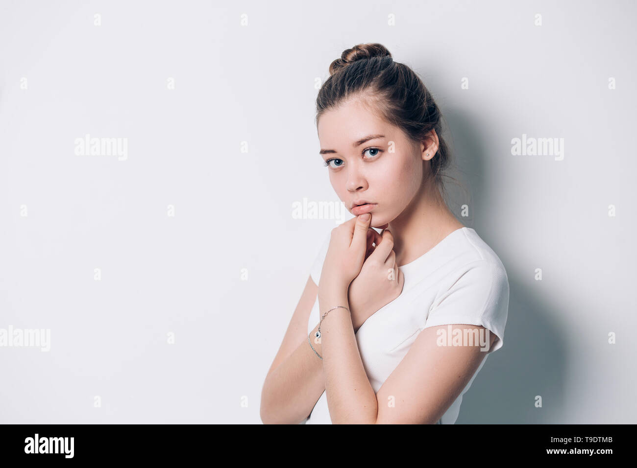 beautiful sad woman serious and concerned looking worried and ...