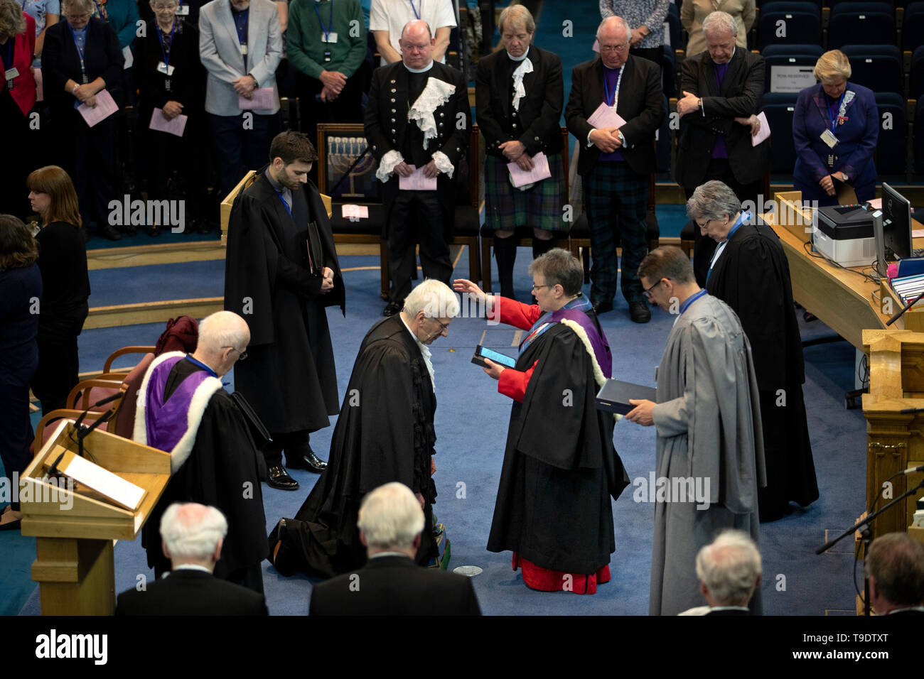 Former moderator Very Rev Susan Brown (right) consecrates the new ...