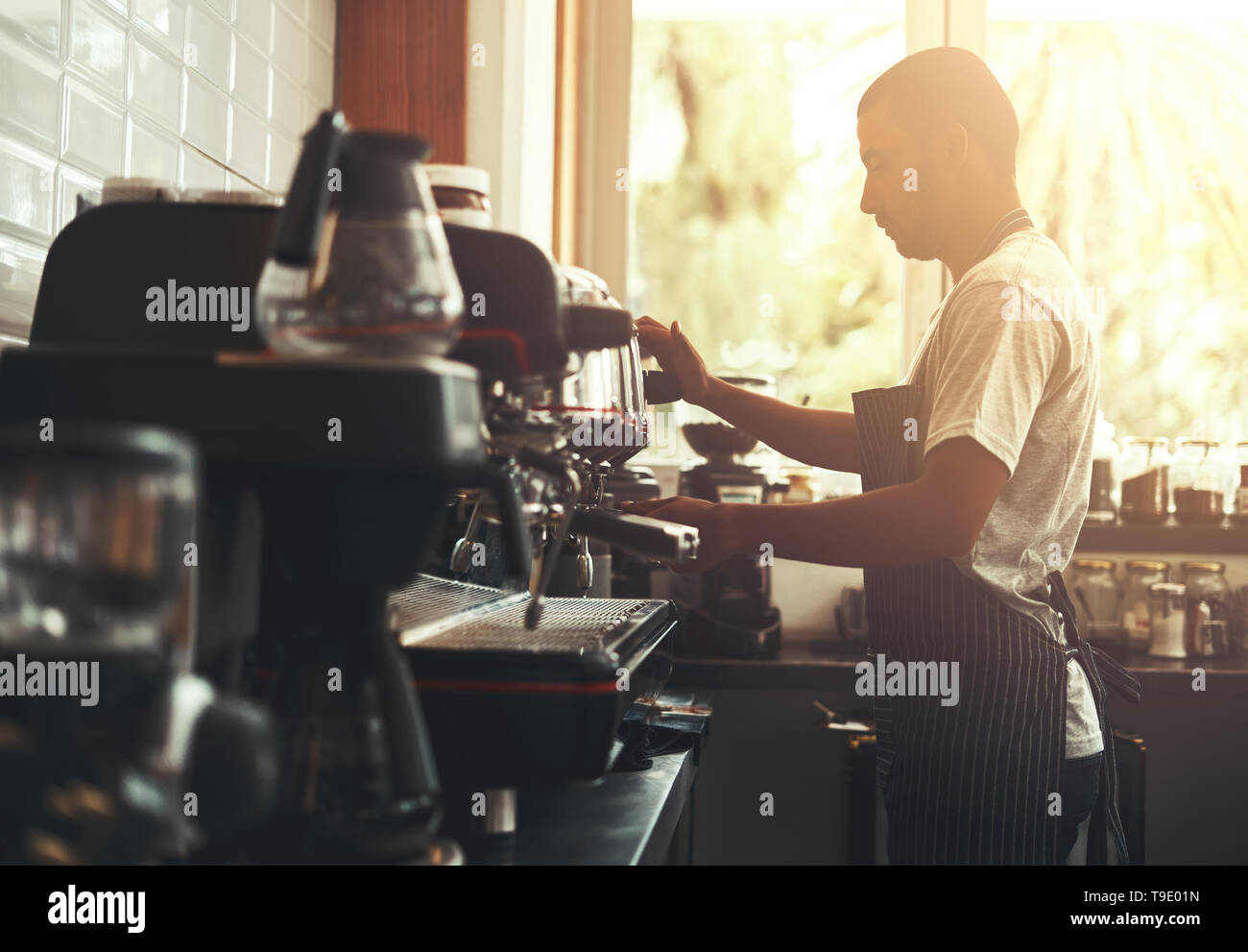 Coffee shop barista prepares coffee hi-res stock photography and images ...
