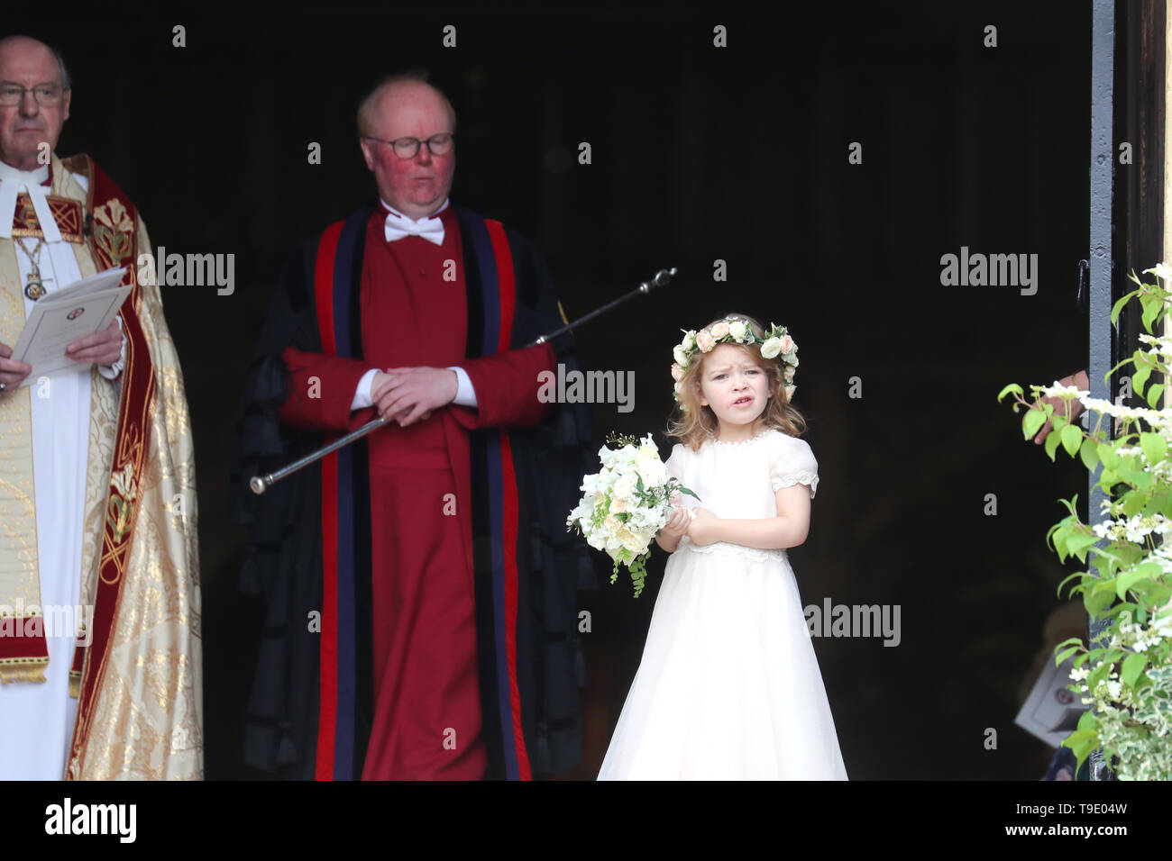 Dean of Windsor, The Right Revd David Conner (L) and a young bridesmaid ...