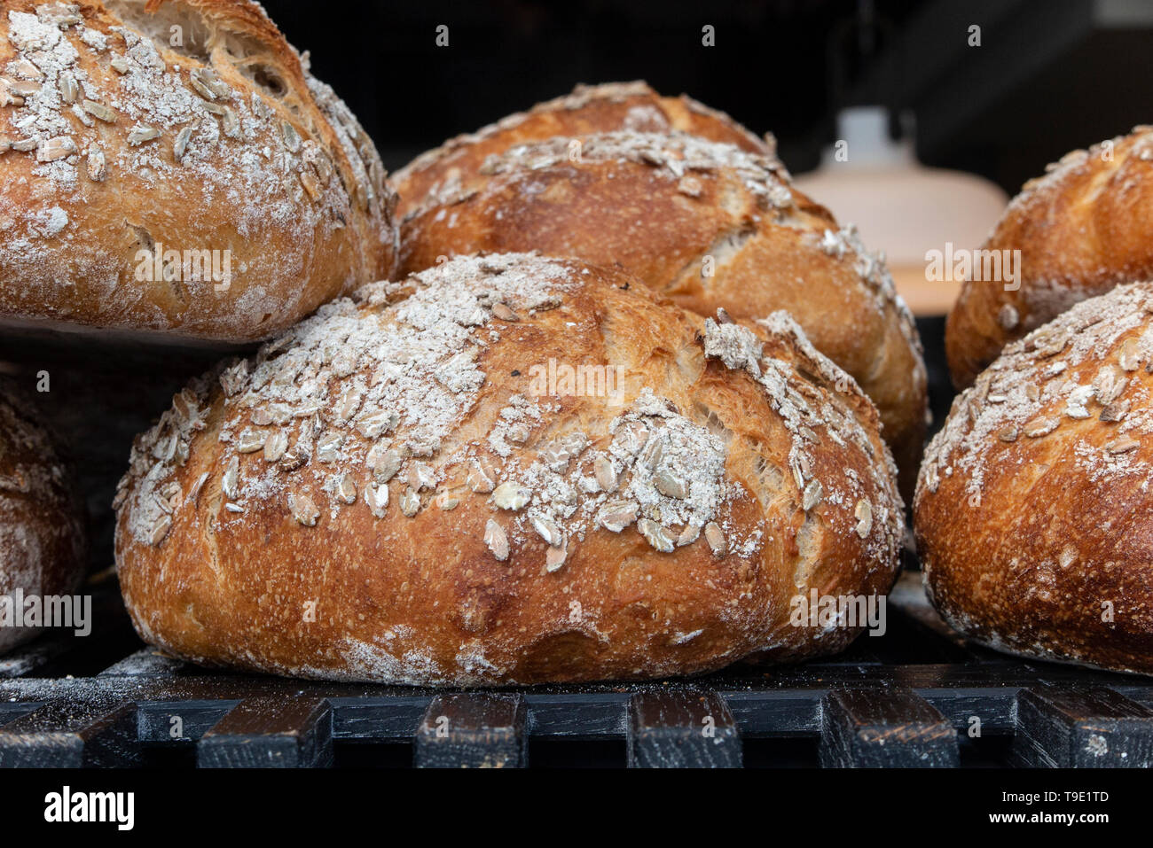 Loaves of white bread stacked up and ready for breakfast Stock Photo ...