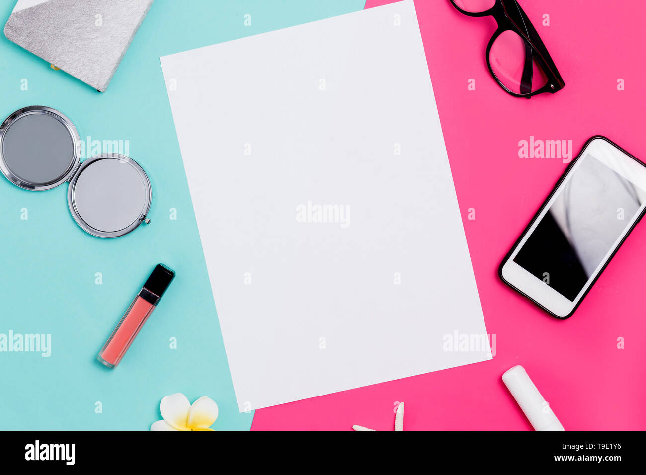 Flat lay top view photo. Mockup on a white colorful pink and blue ...