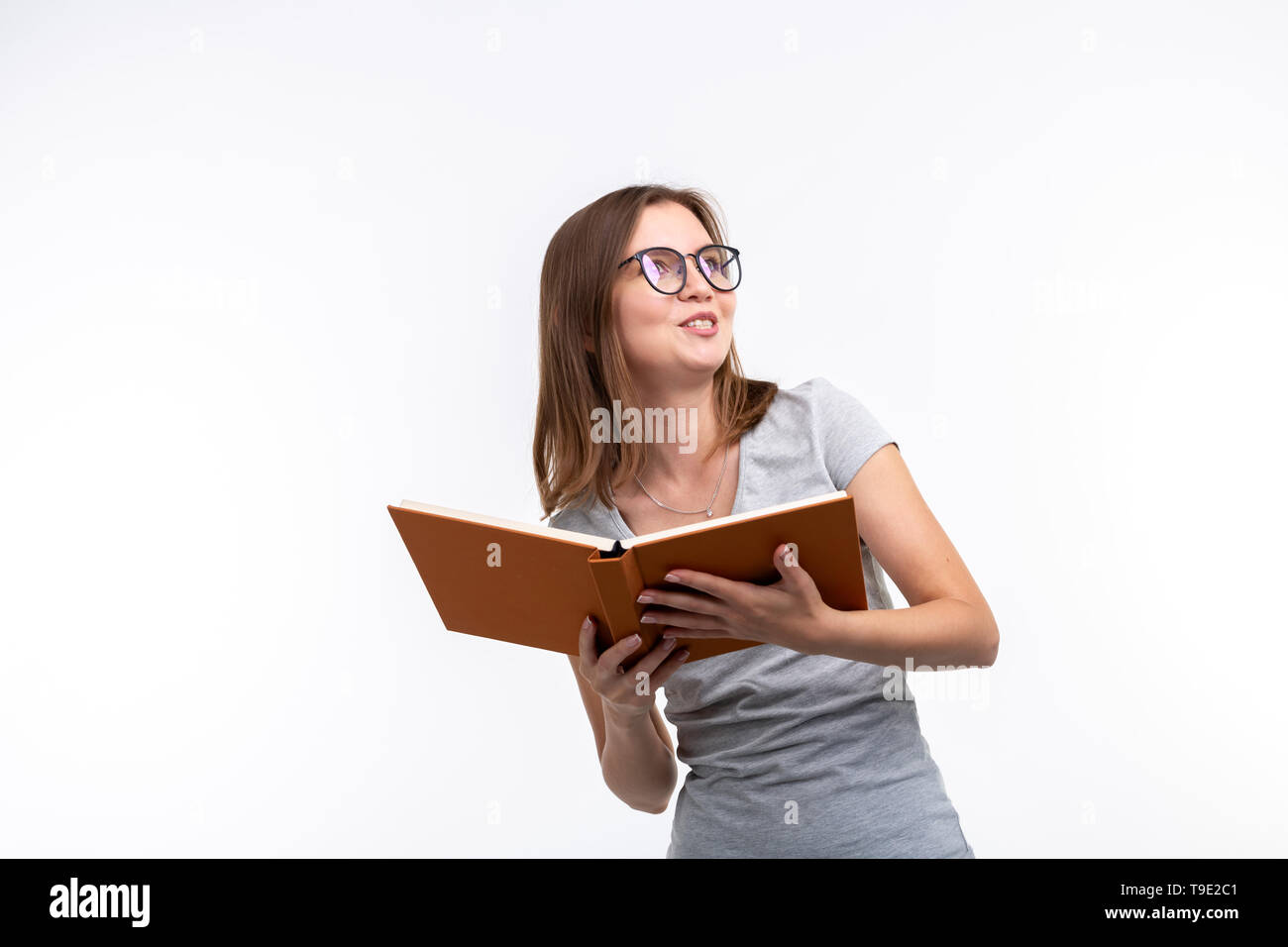 People and education concept - Attractive woman reading a book over ...