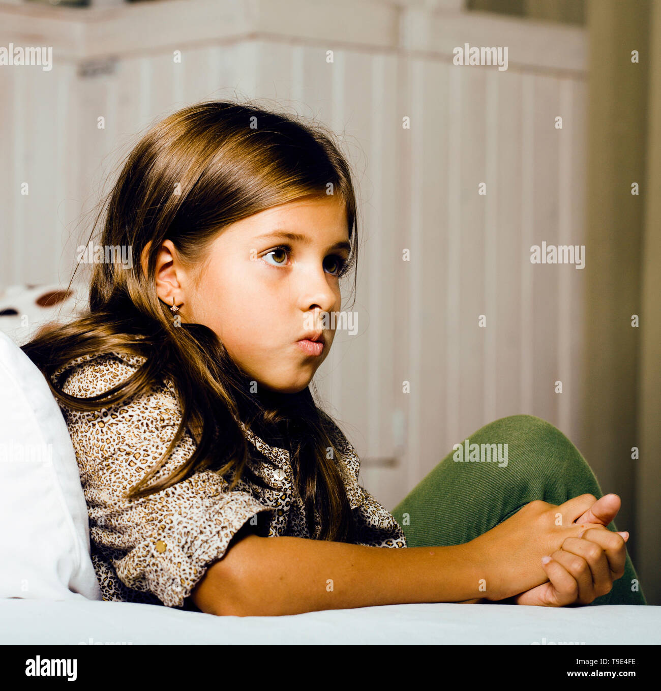 little cute brunette girl at home interior happy smiling close up ...