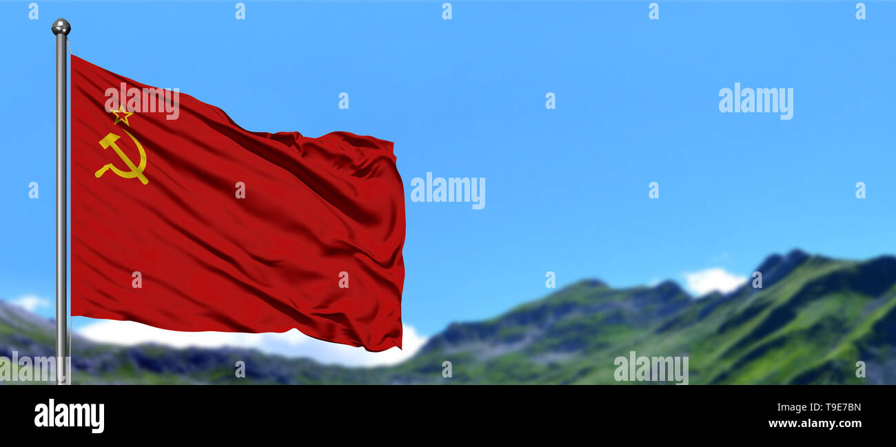 Soviet Union flag waving in the blue sky with green fields at mountain ...