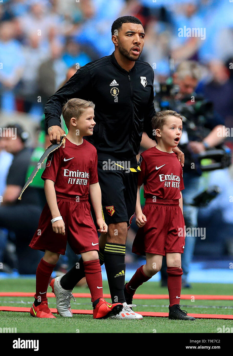 Watford's Troy Deeney walks out with mascots, Elton John and David ...