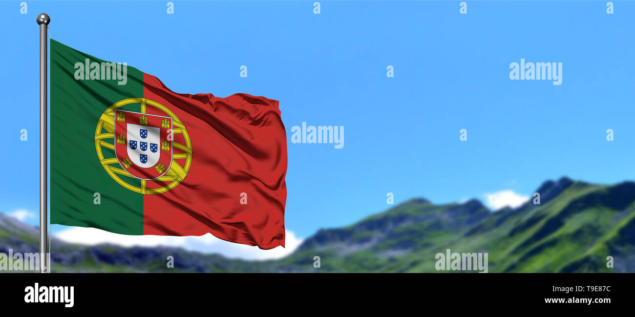 Portugal flag waving in the blue sky with green fields at mountain peak ...
