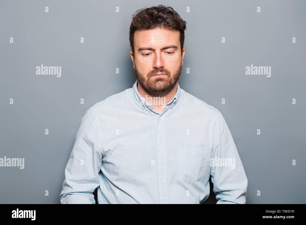 Sad worried male hi-res stock photography and images - Alamy