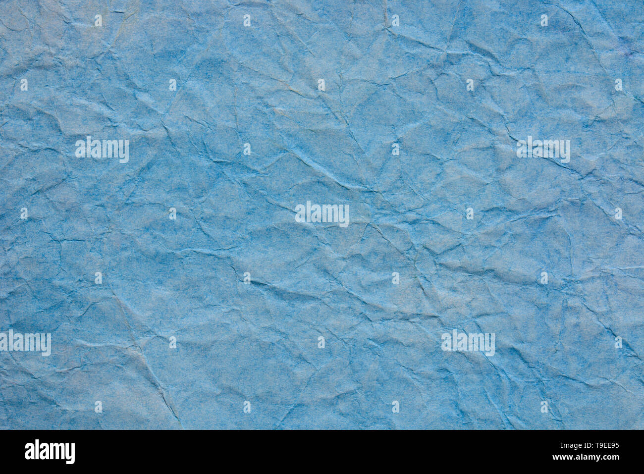 blue color creased pastel paper background texture Stock Photo - Alamy