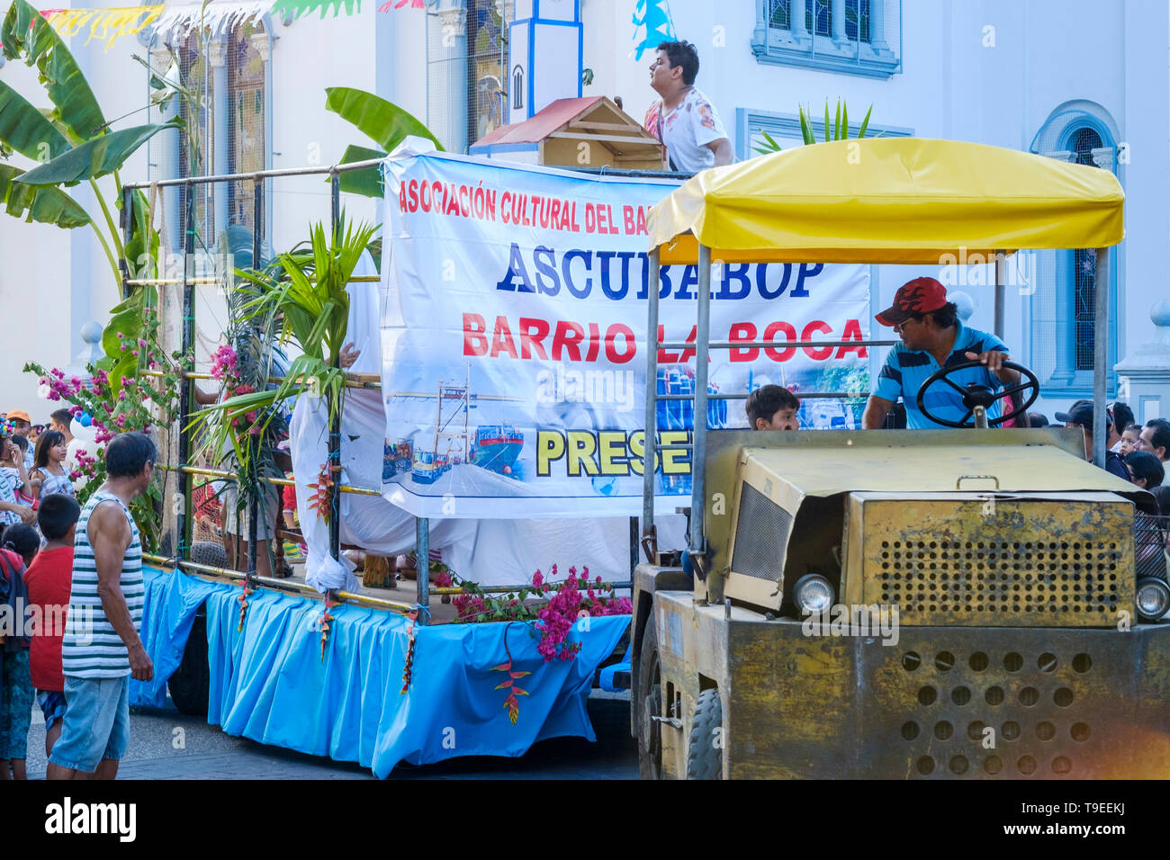 People in disguise dance and celebrate their traditions on the parade ...