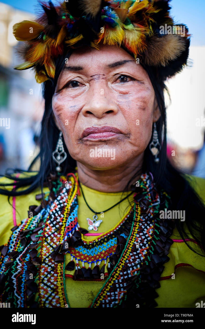 People in disguise dance and celebrate their traditions on the parade ...