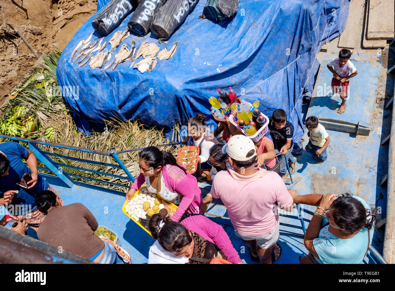 Community on the riverbank seen on the ferry Yurimaguas-Iquitos line ...