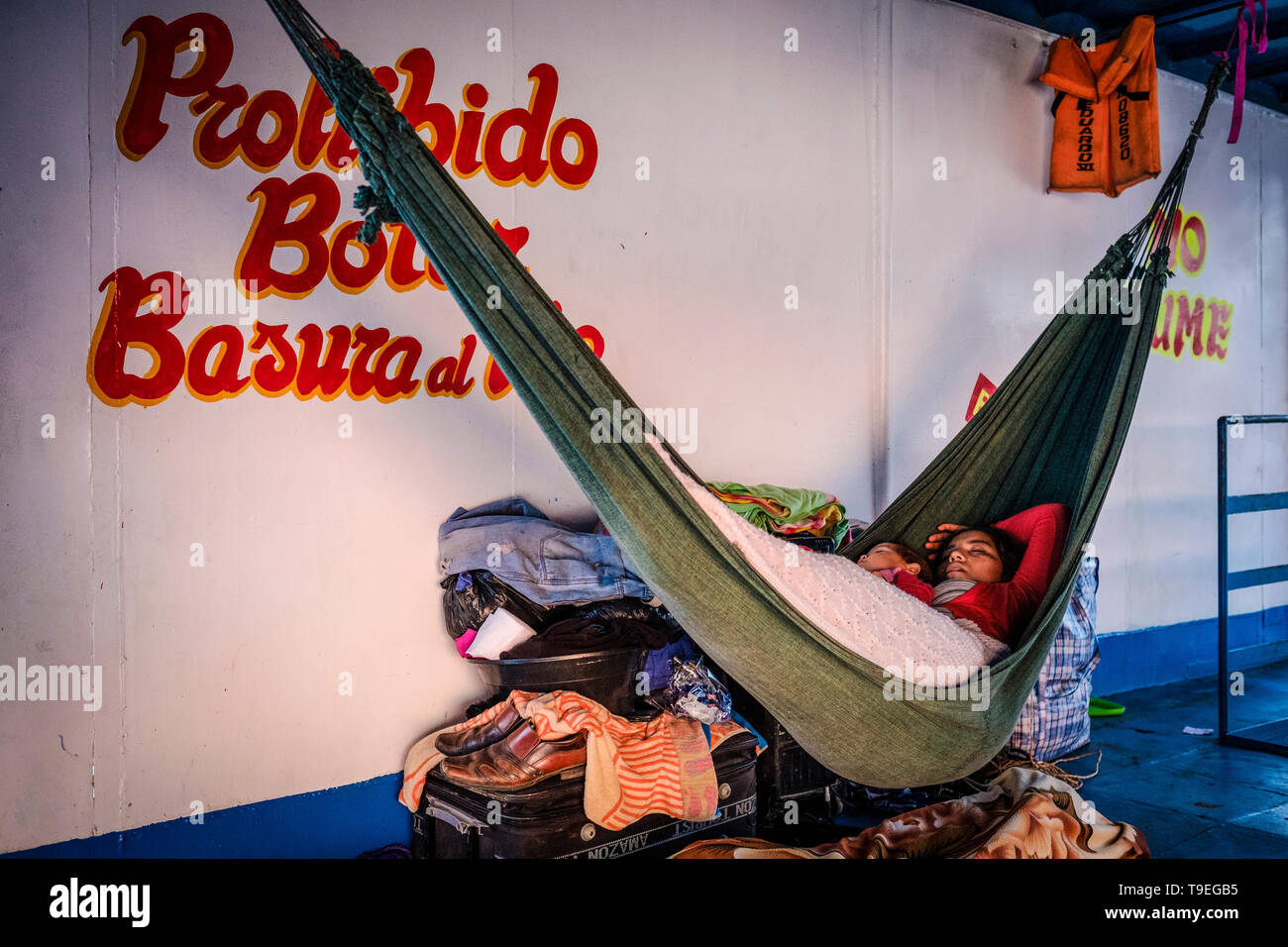 Hammocks for passengers set on the deck of the lancha or ferry that ...