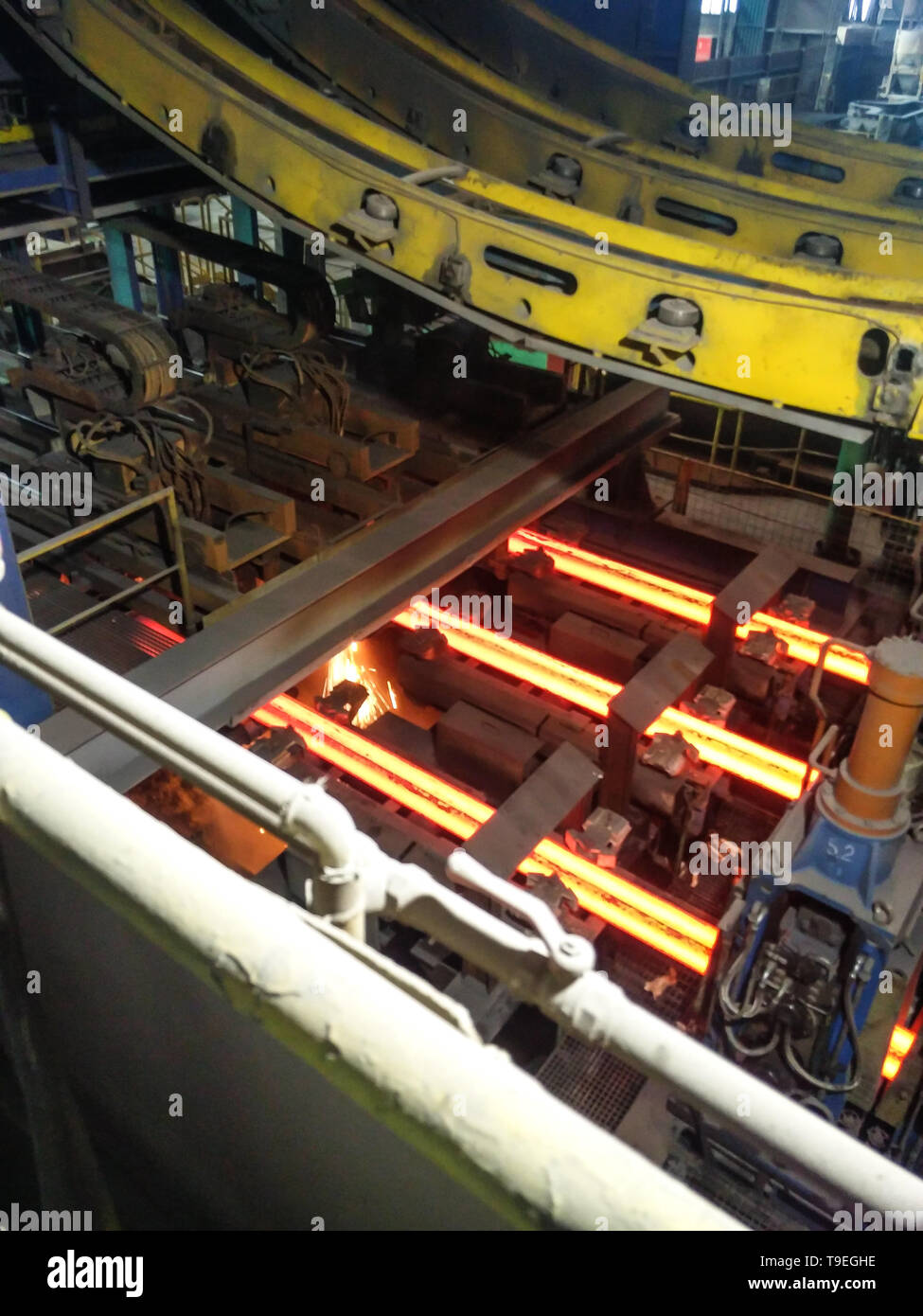 Smelting of metal in big foundry. Iron and steel production at a ...