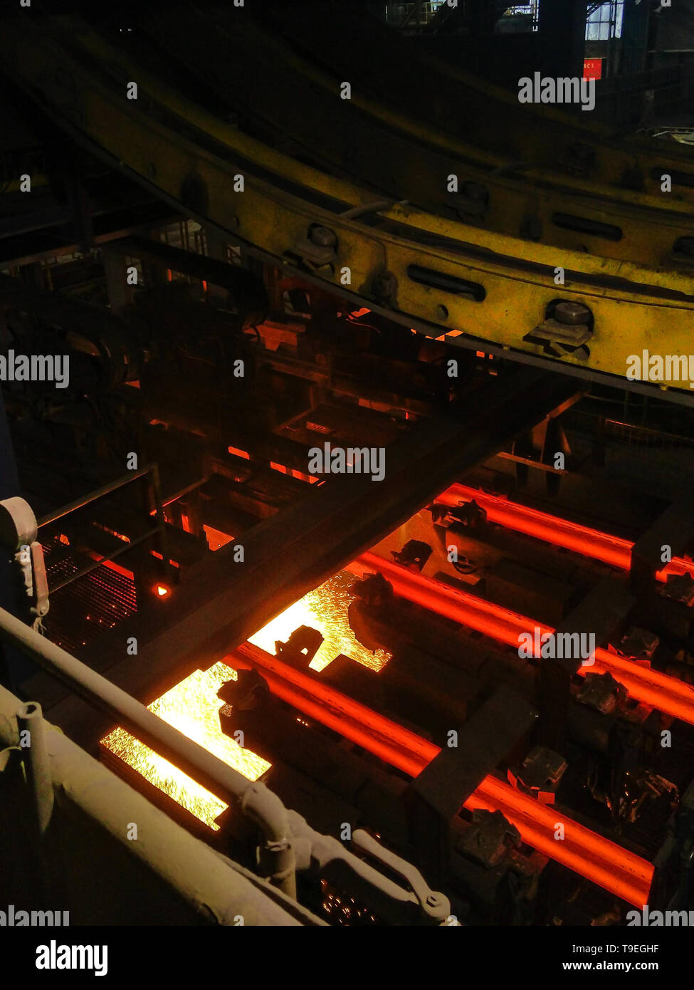 Smelting of metal in big foundry. Iron and steel production at a ...