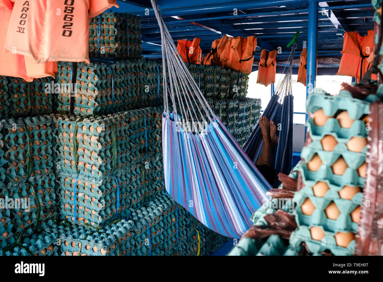 Shipment of chicken eggs on the ferry that covers the Yurimaguas ...