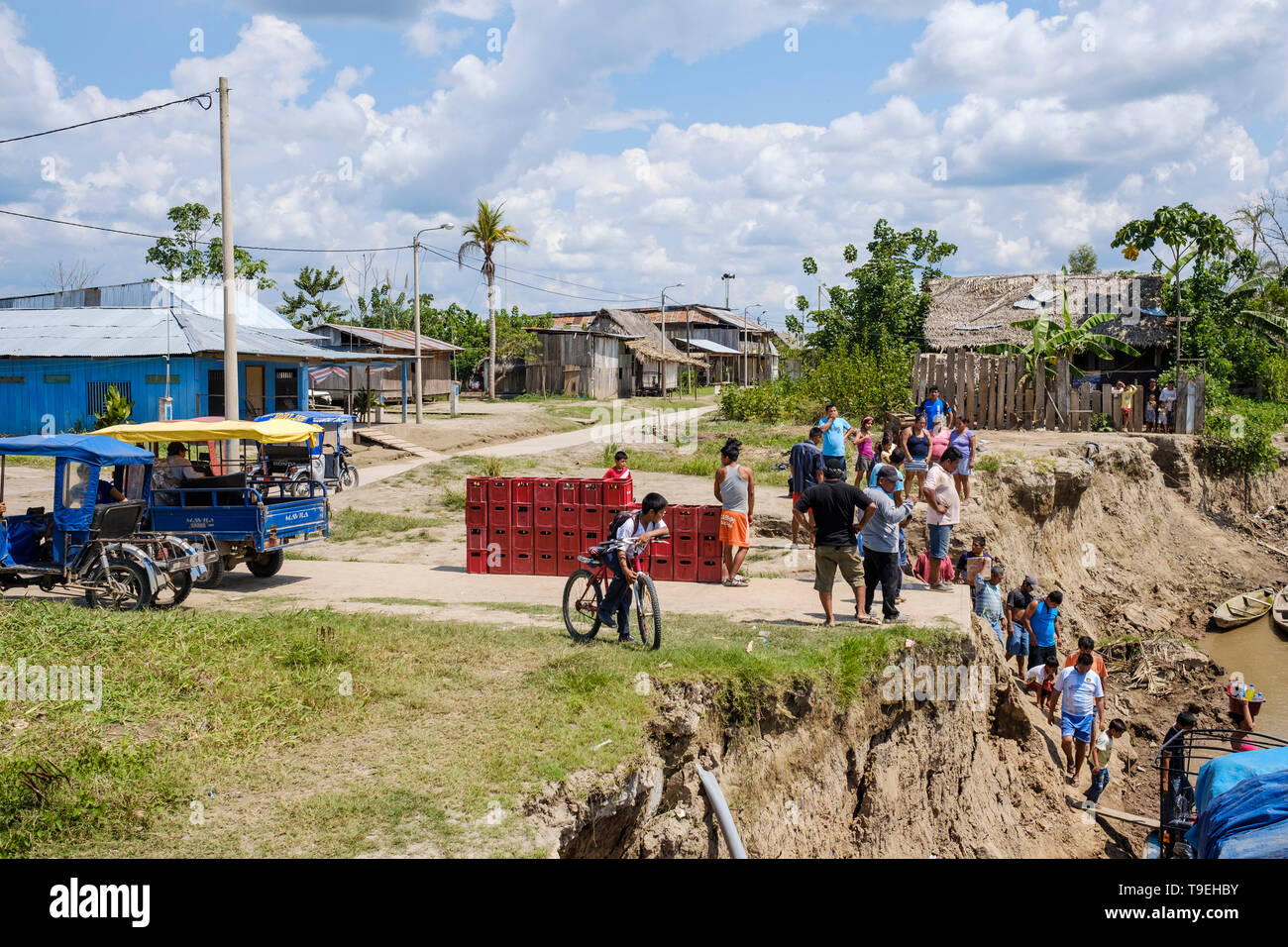 Community on the riverbank seen on the ferry Yurimaguas-Iquitos line ...