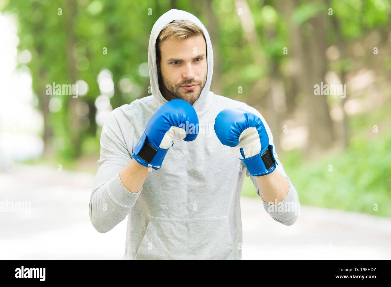 Training for big day. Man athlete on concentrated face with sport ...