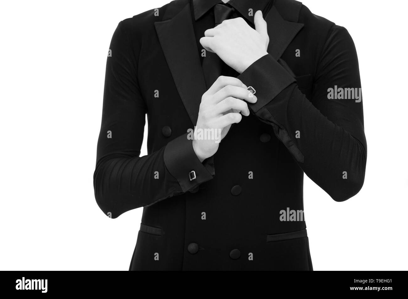 Hands adjust sleeve. Fashionable caucasian male isolated on white ...