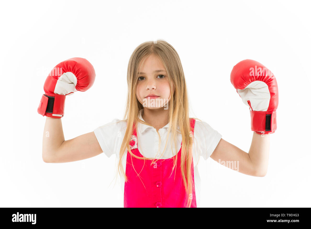 Cute boxer. Girl on dreamy calm face posing with boxing gloves ...