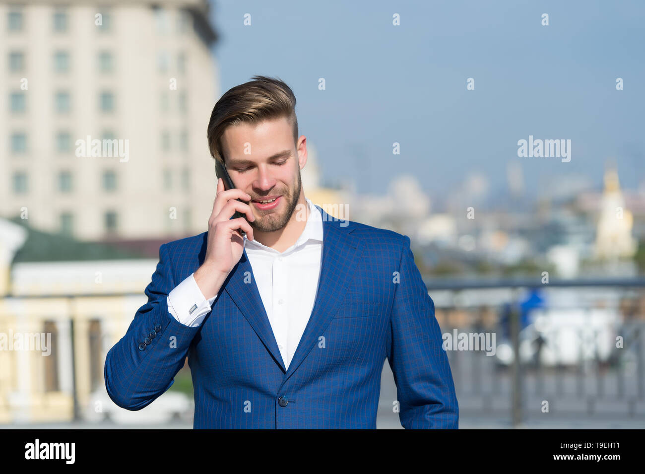 Important business call. Businessman happy smiling use smartphone for ...