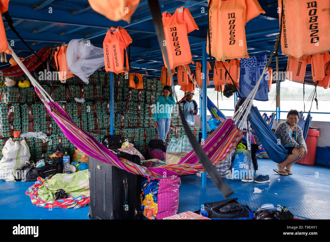 Hammocks for passengers set on the deck of the lancha or ferry that ...