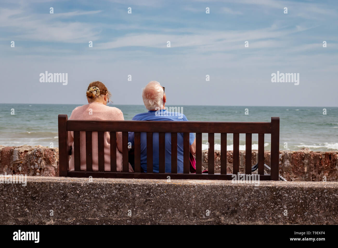 Old Couple Bench Wall High Resolution Stock Photography and Images - Alamy