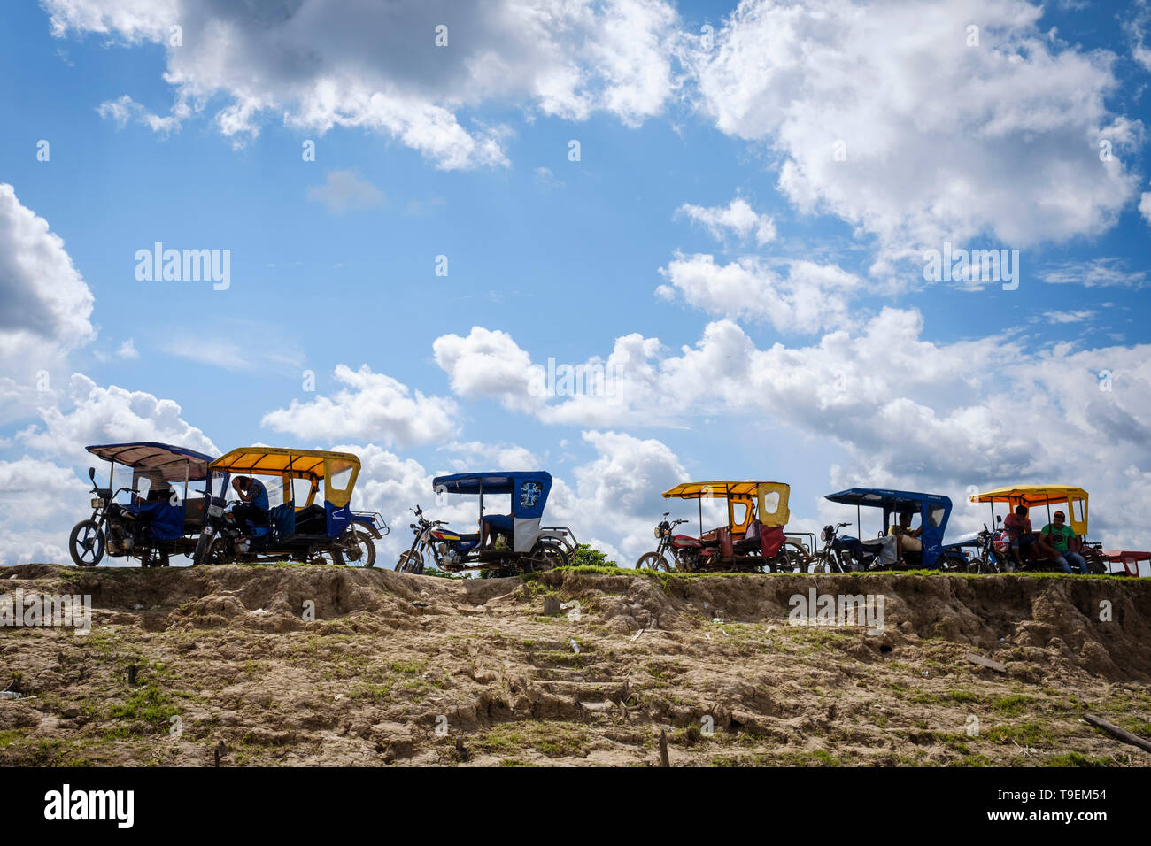 Moto taxis in line waiting for clients at Padre Cocha port on Nanay ...