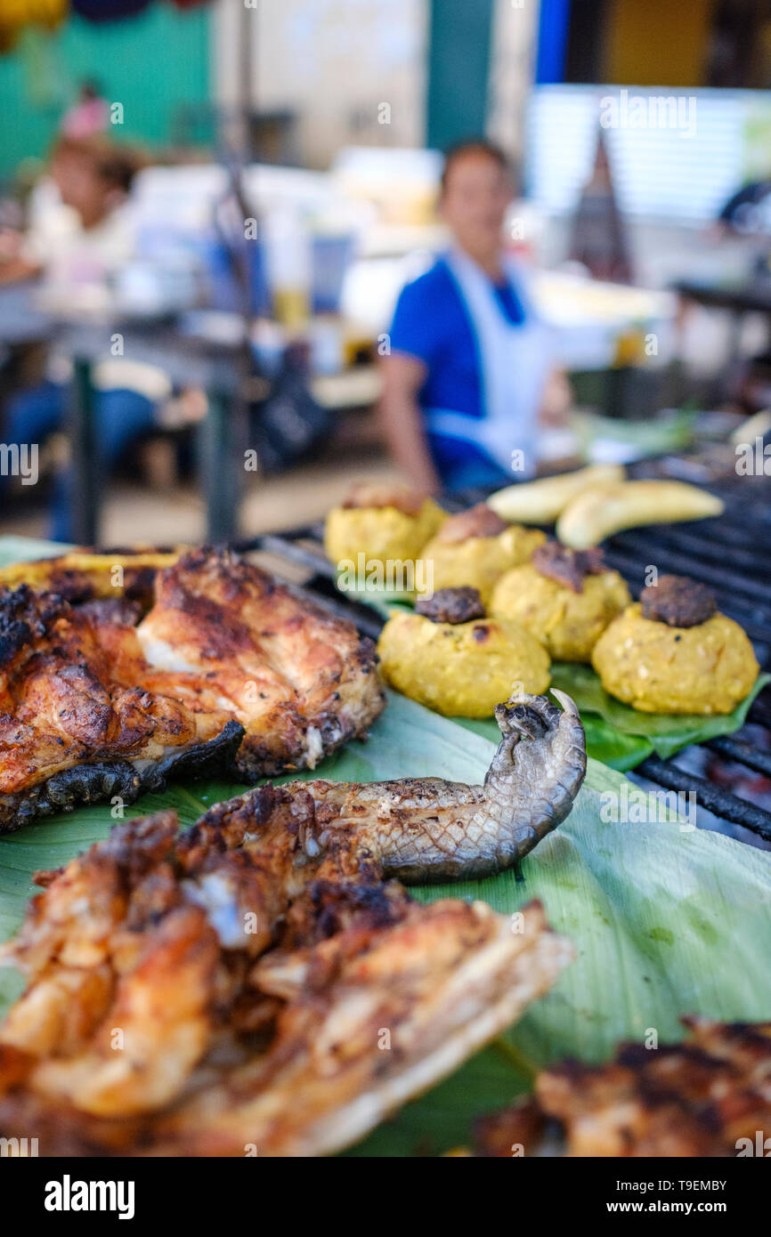 Lizard ready to eat on the menu of an eatery at Bellavista Nanay River ...