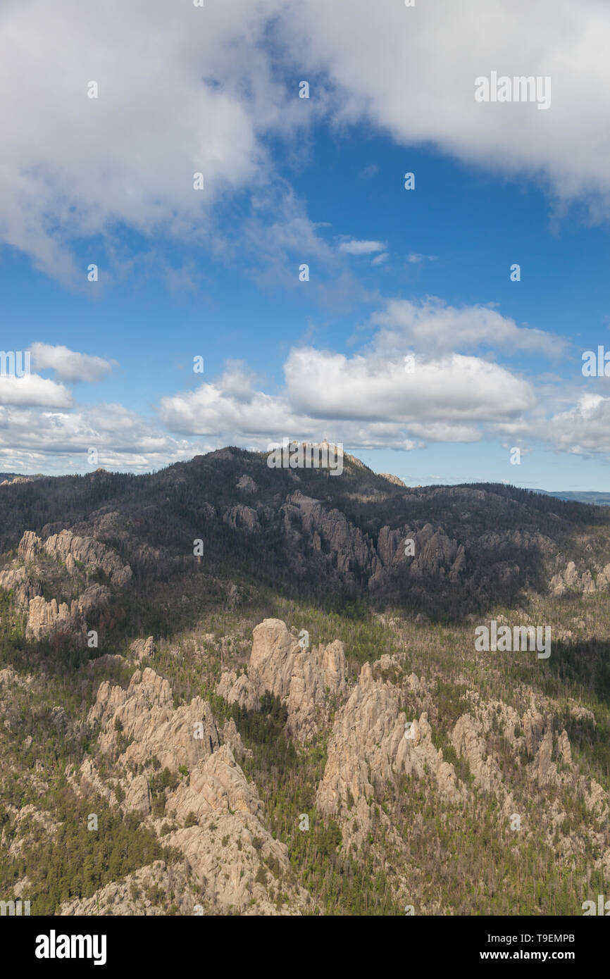 An aerial view of a mountain eroded to expose spires of tall quartz ...