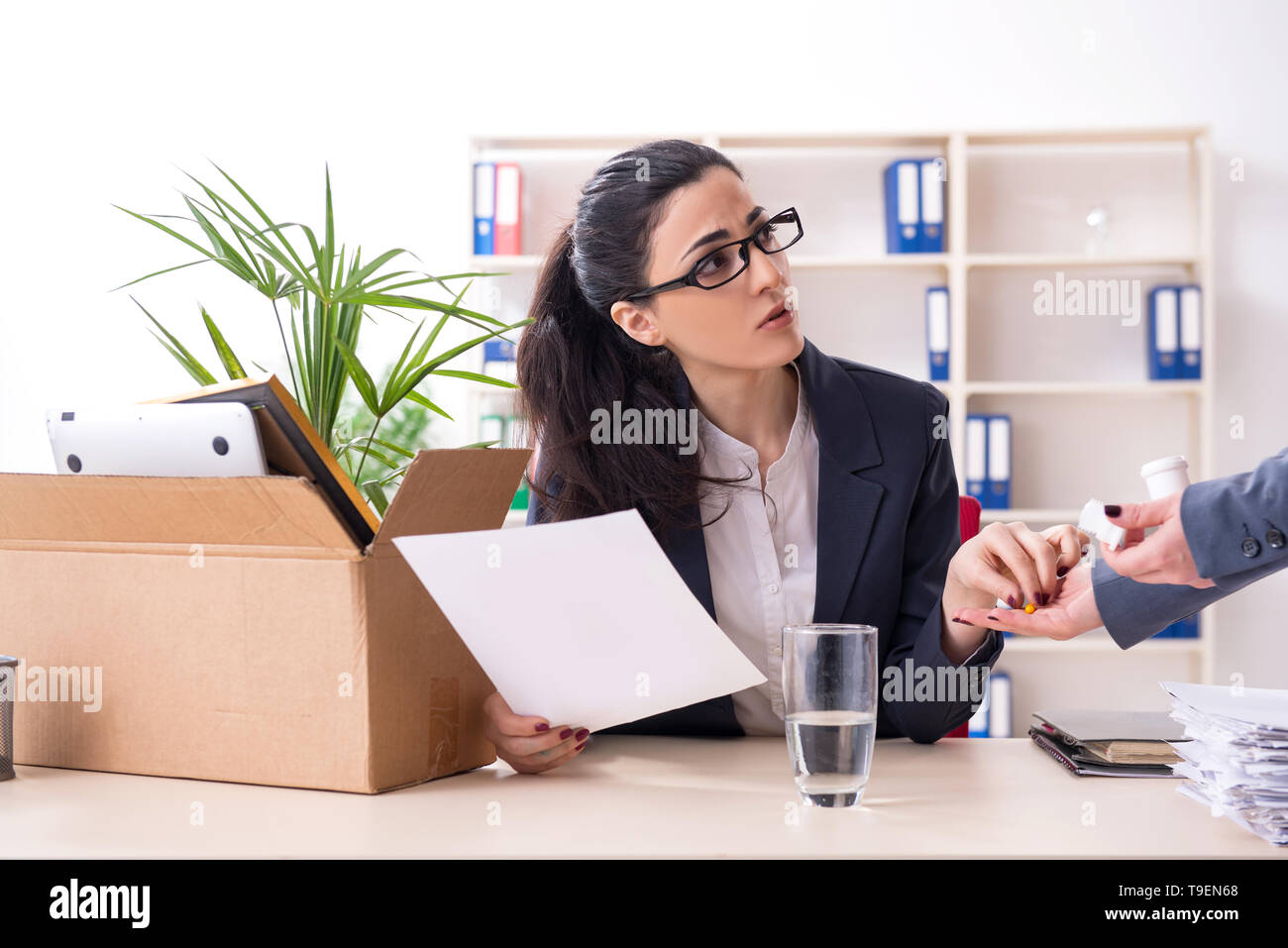 Young female employee being fired from her work Stock Photo - Alamy