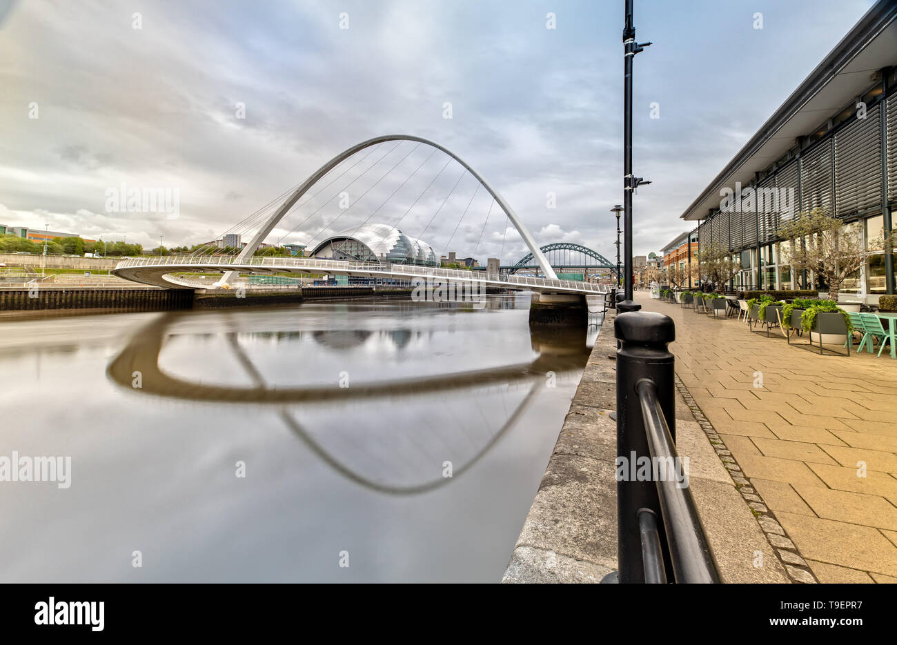 The Gateshead Millennium Bridge in Newcastle upon Tyne in Great Britain ...