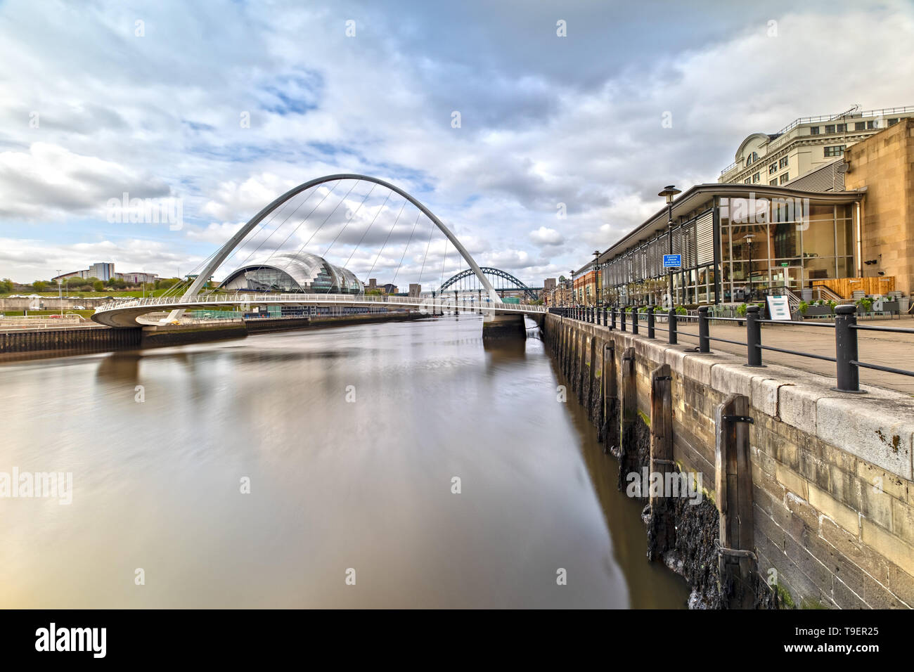 The Gateshead Millennium Bridge in Newcastle upon Tyne in Great Britain ...