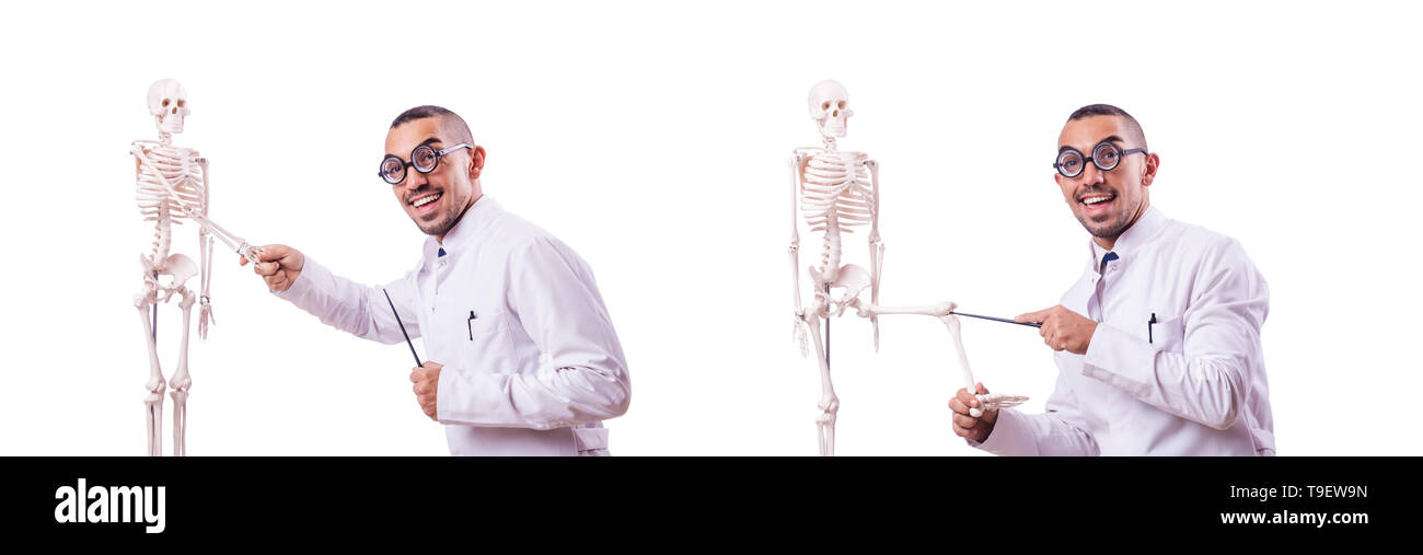 Funny doctor with skeleton isolated on white Stock Photo - Alamy