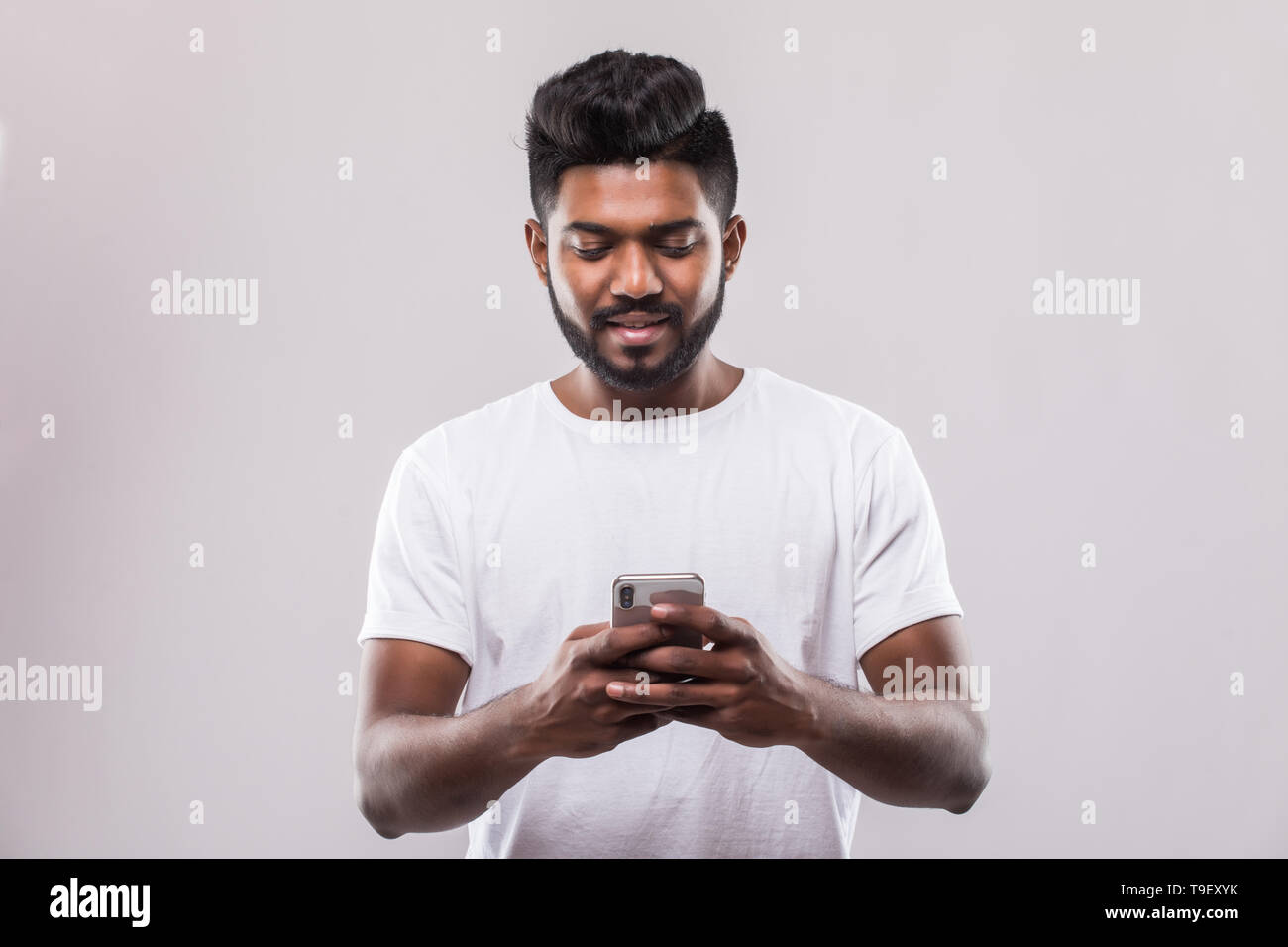 Indonesian man mobile standing hi-res stock photography and images - Alamy