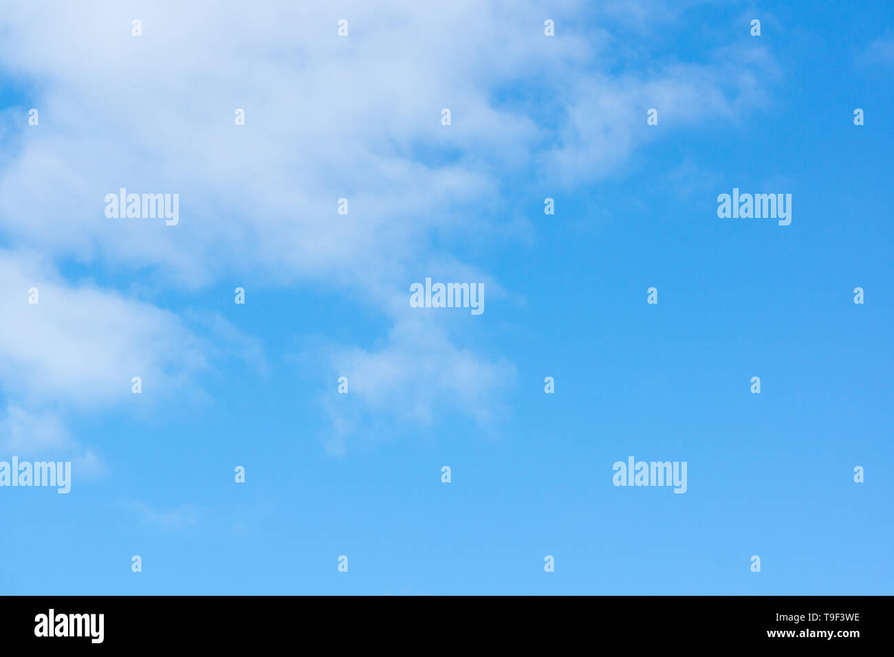 blue sky with flying white light clouds Stock Photo - Alamy