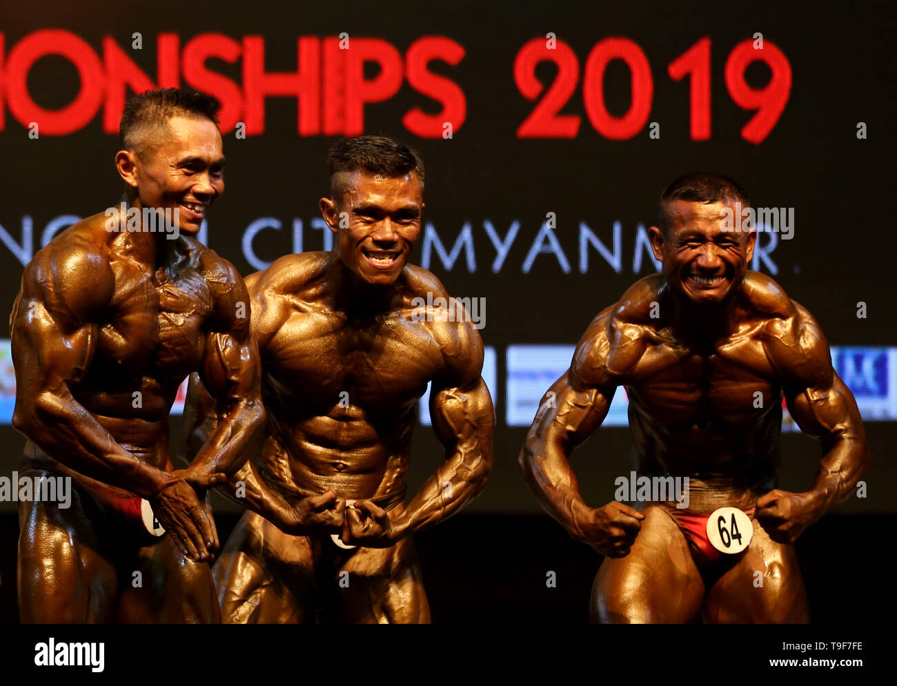 Yangon. 18th May, 2019. Contestants compete in men's 65kg event during ...