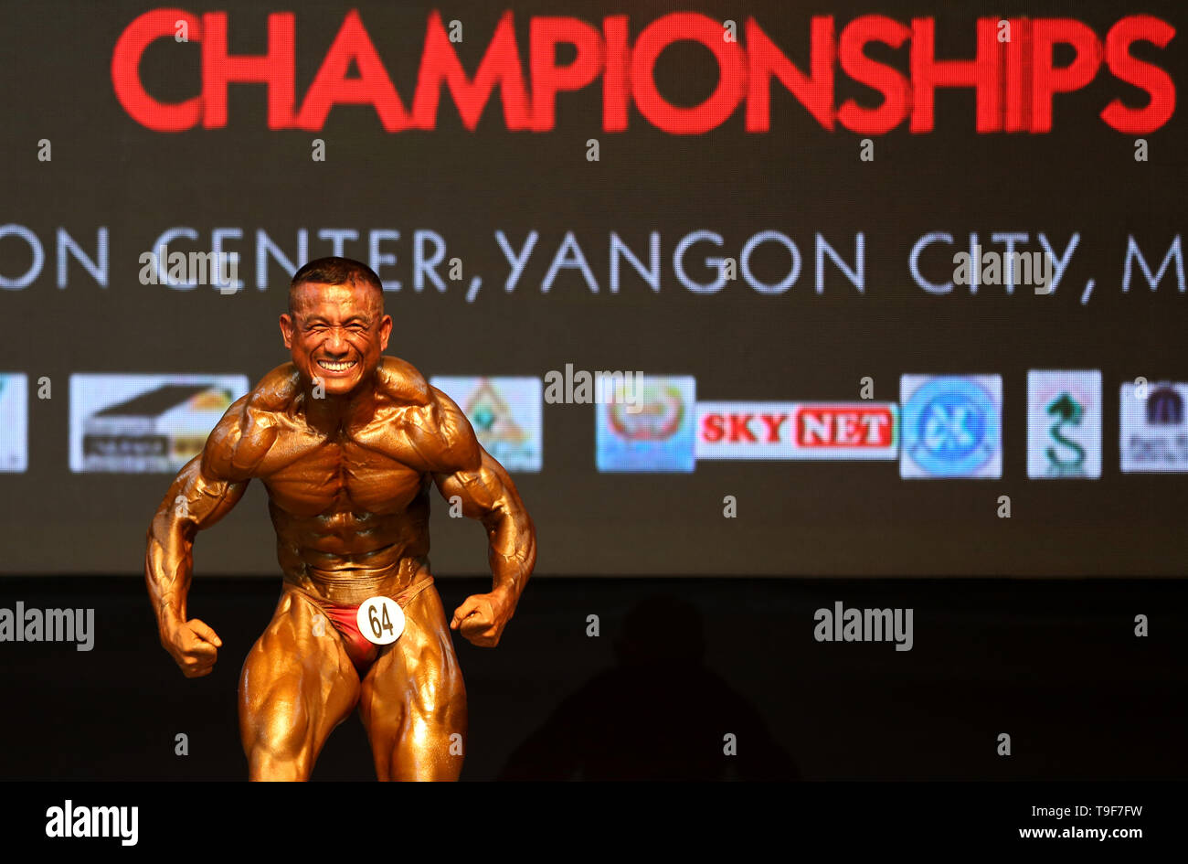 Yangon. 18th May, 2019. Ja War Naw of Myanmar competes in men's 65kg ...