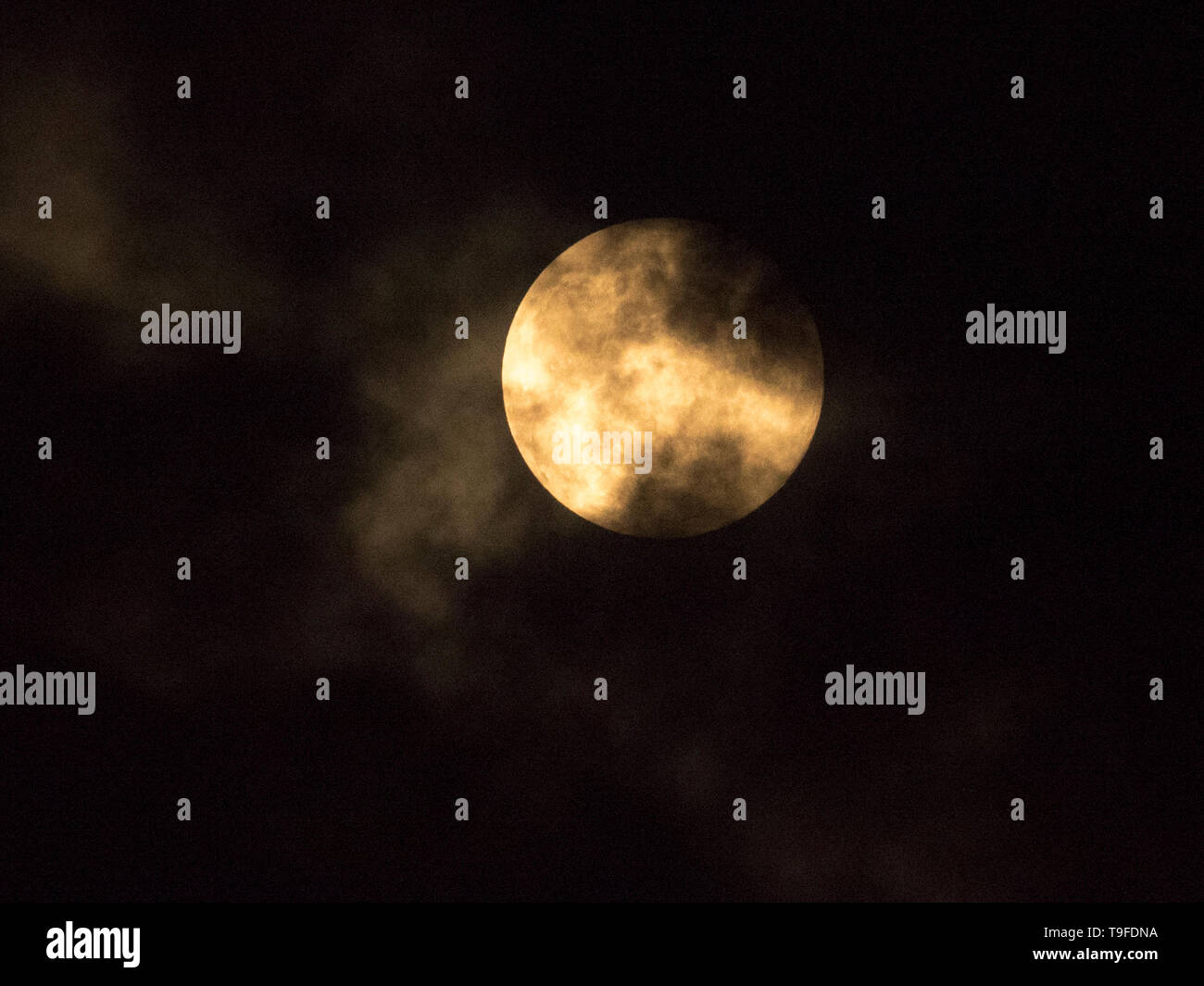 Full moon through cloud cover hi-res stock photography and images - Alamy