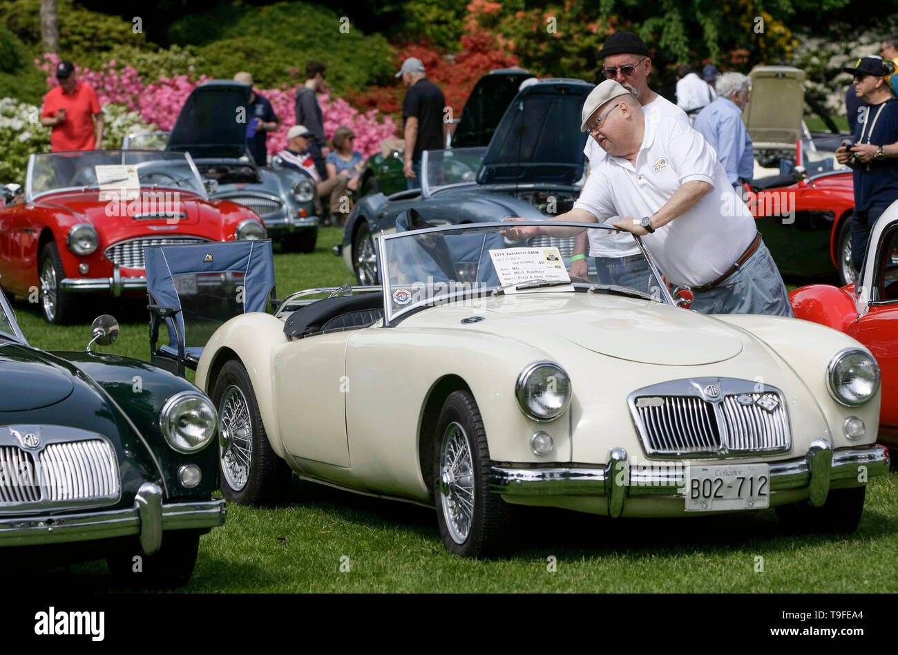 Vancouver, Canada. 18th May, 2019. A classic car owner shows his 1956 ...