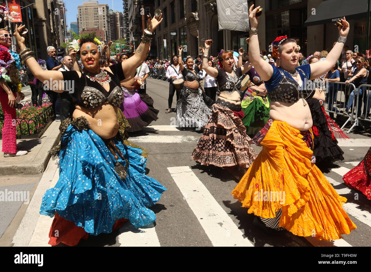 New York, USA. 18th May, 2019. Parade goers display their dance moves ...