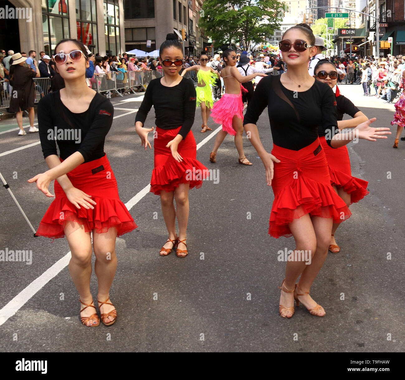 New York, USA. 18th May, 2019. Parade goers display their dance moves ...