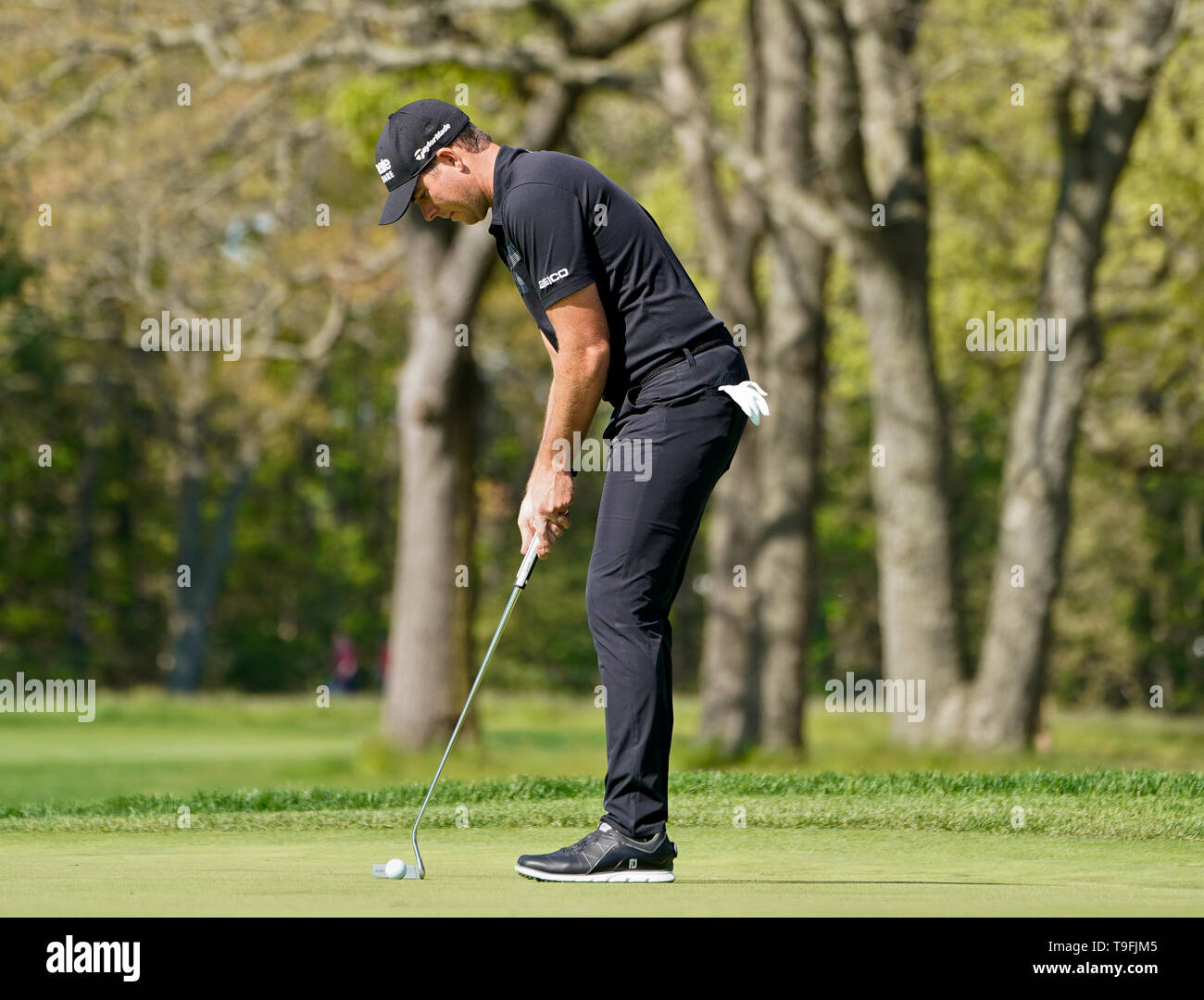 Bethpage, New York, USA. 18th May, 2019. Luke List lines up a putt on ...