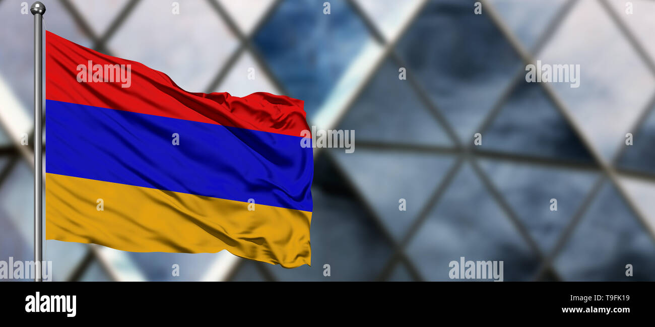 Armenia flag waving in the wind against blurred modern building ...